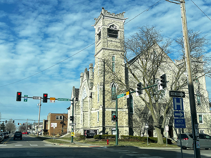 Historic charm meets small-town energy at this beautiful stone church in Iowa City, standing tall at a busy intersection.