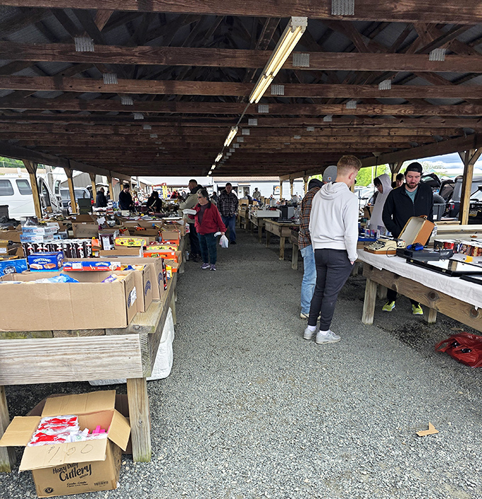 The covered pavilion at Jake's houses vendors rain or shine. Wooden beams frame a marketplace that's been connecting buyers and sellers for generations.