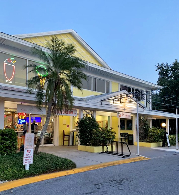 Lazy Lobster's cheerful yellow building is like sunshine you can eat at. Florida flora frames a seafood experience worth writing home about.