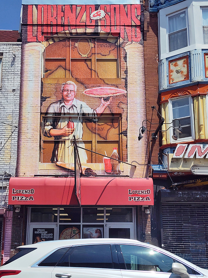 South Street's colorful chaos provides the perfect backdrop for Philadelphia's most legendary pizza slice experience.
