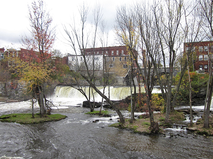 The perfect Vermont trifecta: white church steeple, brick buildings, and enough fall foliage to make your Instagram followers jealous.