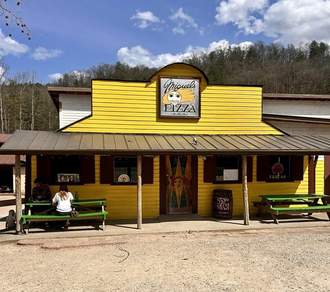 Miguel's sunshine-yellow fa&ccedil;ade stands out against Kentucky's natural beauty like a pizza paradise in the wilderness.