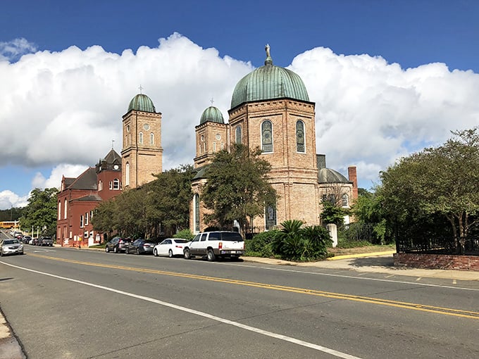 Copper-green domes rise majestically in America's oldest Louisiana Purchase settlement where history lives affordably.