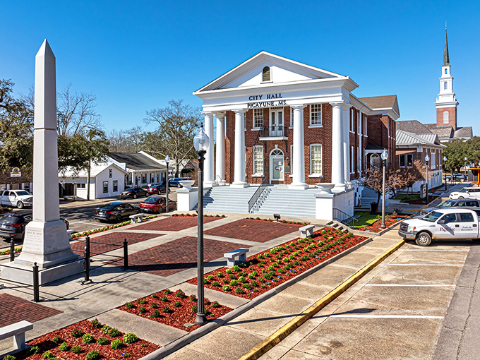 Classic courthouse architecture anchors communities where civic pride shows in every carefully maintained detail and flower.