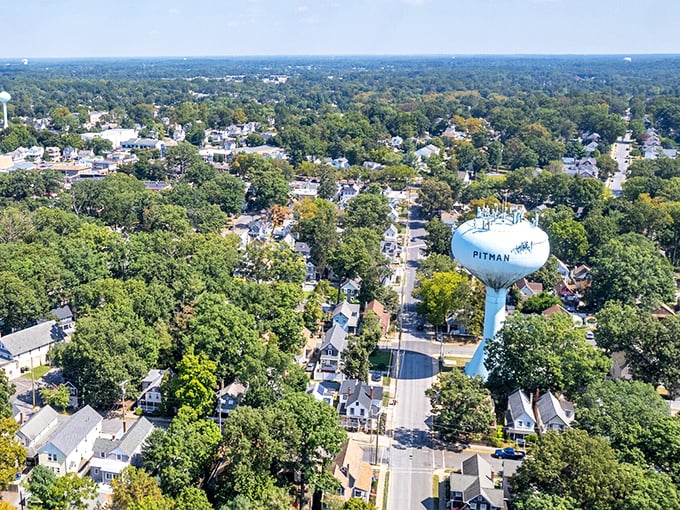 Pitman's water tower stands tall above a canopy of trees that shelter this charming small town.
