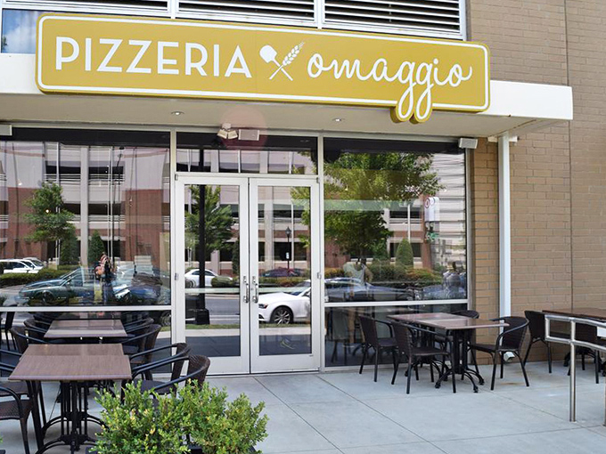 Pizzeria Omaggio's sleek modern design hints at the Italian elegance waiting inside those pristine glass doors.