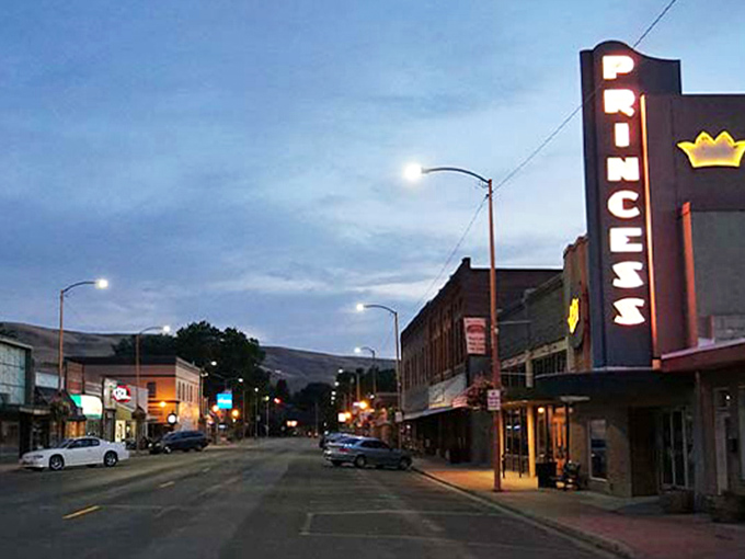 The Princess Theatre sign illuminates Prosser's evening like a Broadway marquee that took a wrong turn and found paradise among the rolling hills instead.