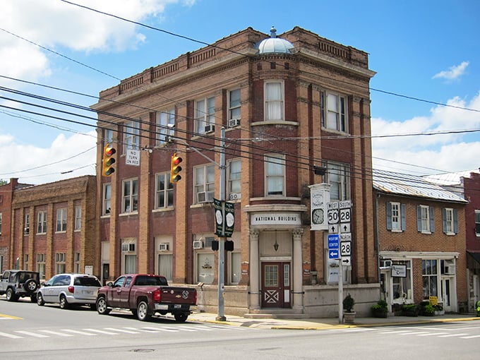 Banking on affordability! Romney's historic corner building stands like a monument to small-town prices that won't bounce your retirement check.