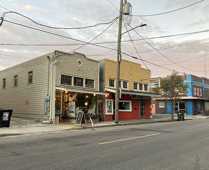 Colorful corner charm that looks like it was painted by someone who truly loves their neighborhood.