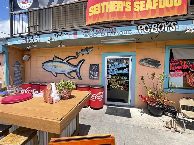 Seither's colorful seafood shack vibes! Where every meal feels like a beach vacation, minus the sunburn.