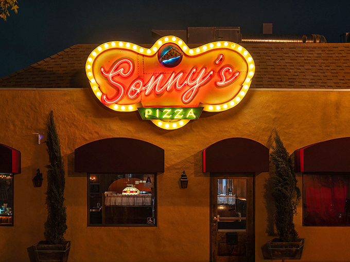 Sonny's neon sign glows like a pizza lighthouse. That vintage marquee has guided hungry San Diegans for generations.