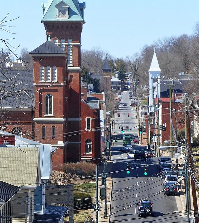 Rolling hills frame Staunton's historic towers like a postcard from America's architectural past.