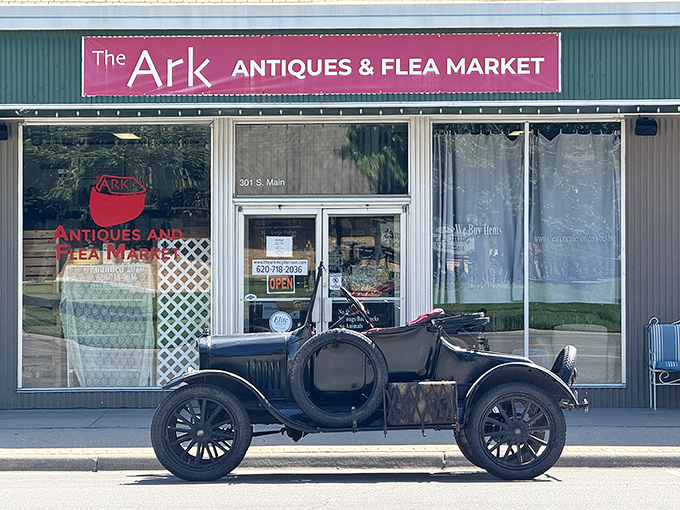 That vintage car out front isn't just decoration - it's a promise of the authentic treasures waiting inside this charming storefront.