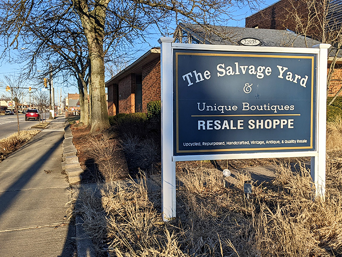 The Salvage Yard's elegant sign promises more than just secondhand - it's a boutique experience for the thrift-savvy.