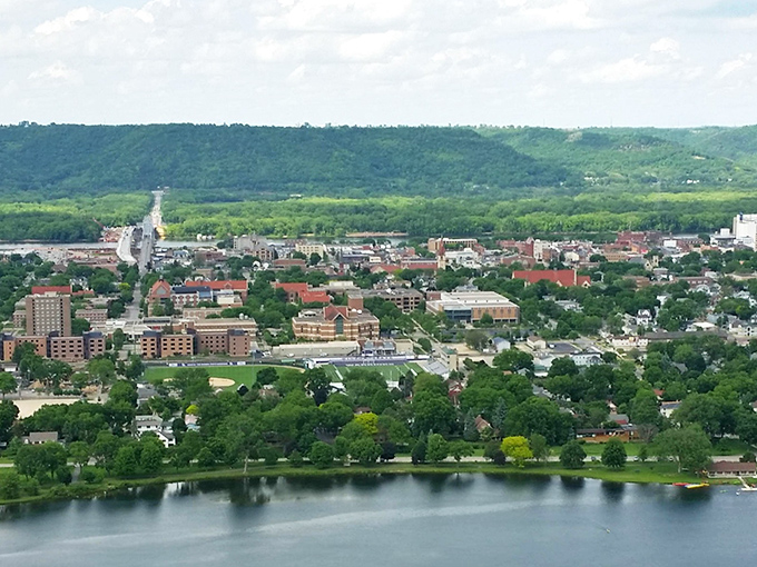 College town energy meets Mississippi River majesty in a community where bluffs create dramatic backdrops daily.