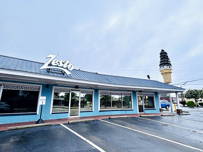 Zesto's iconic ice cream cone sculpture atop that blue building is like a beacon saying, "Yes, you can have dessert after your hot dog!"