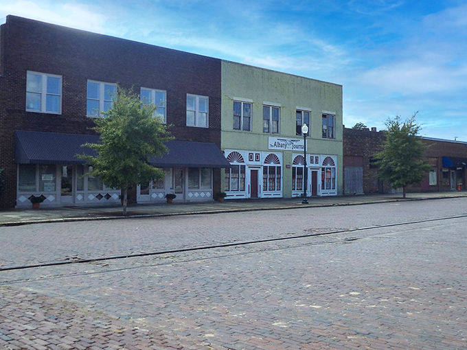 The kind of downtown where you might spot locals greeting each other by name while enjoying the shade of buildings that have stood for generations.