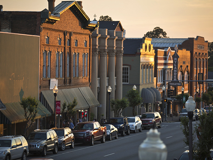 The golden hour bathes Americus's historic downtown in warm light, highlighting architecture that outshines its modest cost of living.