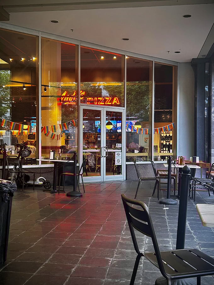 The warm glow of Andy's at dusk transforms an ordinary evening into a slice of pizza paradise.