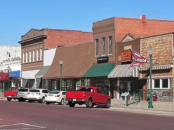 Classic prairie architecture frames this timeless main street where neighbors still wave and everyone knows your name.