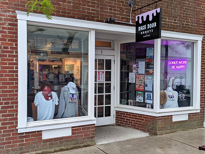 The charming white storefront of Back Door Donuts &ndash; where island vacations gain an extra layer of sweetness after sunset.