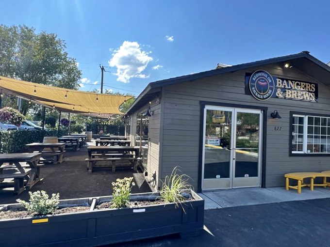 The spacious patio at Bangers & Brews invites you to savor handcrafted sausages under Central Oregon's big sky.