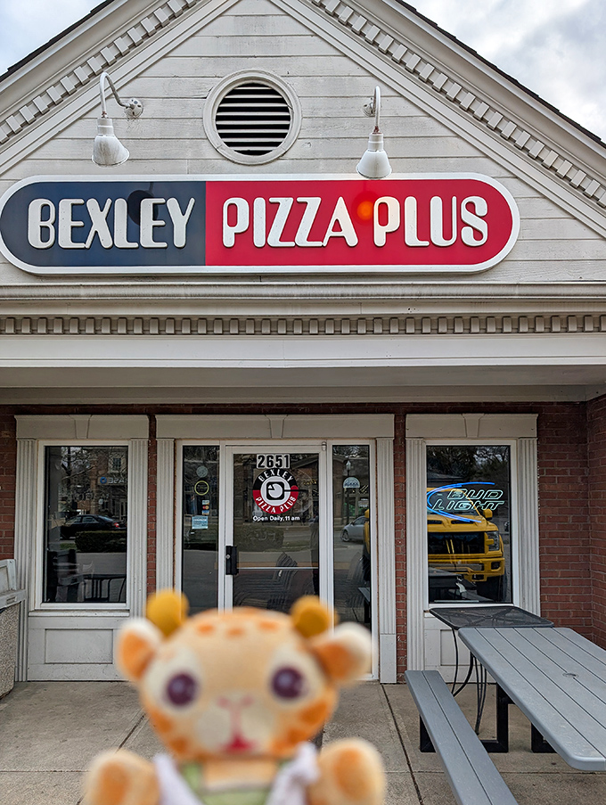 That elegant white building houses pizza wizardry that's won national competitions. Never judge a pizzeria by its quaint exterior!