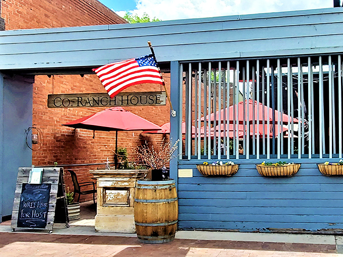 A simple blue exterior hides Co. Ranch House's complex flavors. That American flag says "classic" but the menu is anything but ordinary.