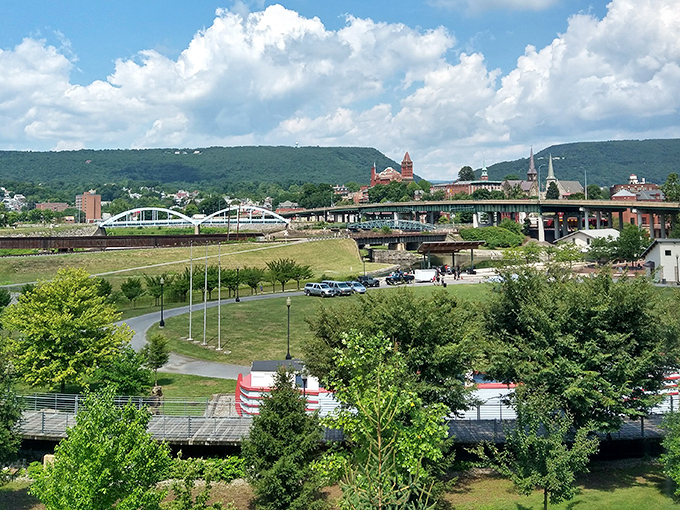 The mountains surrounding Cumberland create a dramatic backdrop that makes even ordinary buildings look extraordinary.