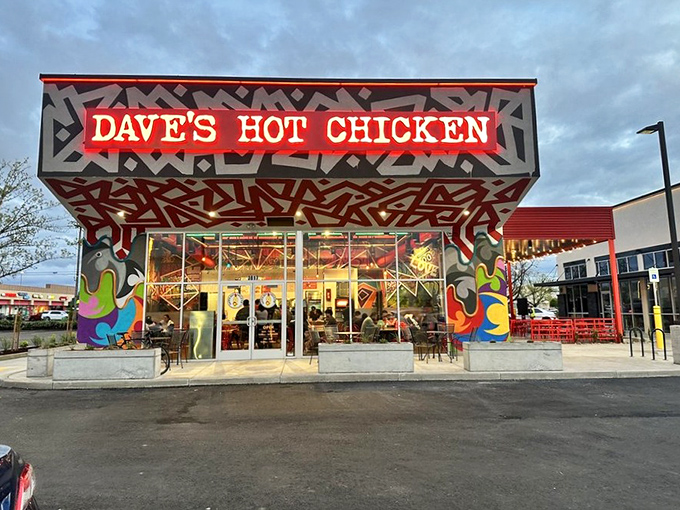 Dave's Hot Chicken's wild exterior art and bold colors hint at the flavor explosion waiting inside this Salem hotspot.