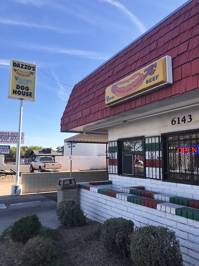 Dazzo's bright red roof signals hot dog heaven ahead. That little white building houses big Chicago-style flavors.