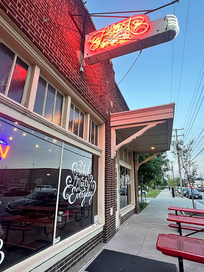 That neon sign glows like a BBQ lighthouse guiding hungry ships to safe, delicious harbor.