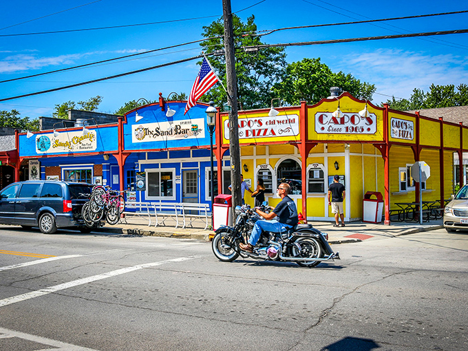 The vibrant buildings of Geneva-on-the-Lake's "Strip" promise fun without pretension. Where neon signs and nostalgia create the perfect summer cocktail!