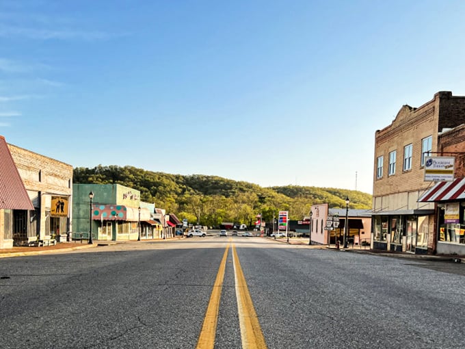 This peaceful main street embodies the unhurried pace of Ouachita Mountain life at its most authentic.