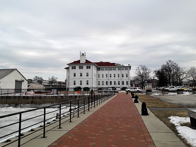 This waterfront promenade leads to a community where maritime history meets modern-day savings opportunities.