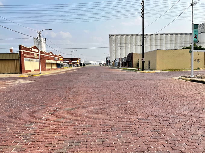 This classic small-town streetscape captures the essence of western Kansas, where big dreams flourish under even bigger prairie skies.