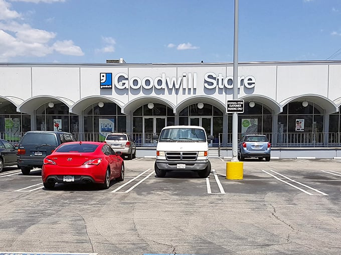 Goodwill's flagship location stands ready for another day of bargain hunting. That sprawling parking lot hints at the massive treasure trove waiting inside.