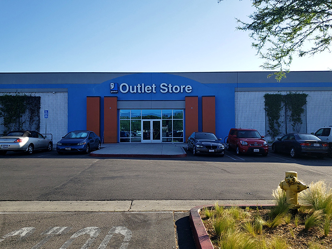 This outlet store's blue exterior promises warehouse-sized deals where donated treasures find their way to grateful new owners.