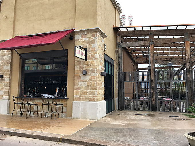 Sunshine bathes Grimaldi's classic exterior in golden light. San Antonio's answer to Brooklyn-style pizza perfection stands ready to serve.