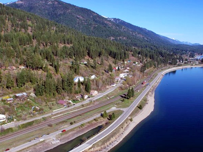Hope clings to the shores of Lake Pend Oreille &ndash; where the water reflects mountains like nature's perfect mirror.