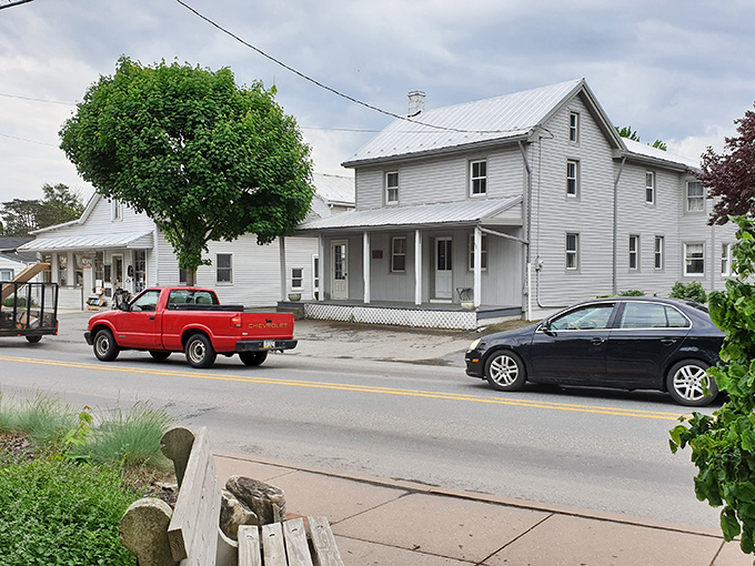 Simple white houses anchor vast agricultural landscapes where every season paints a different masterpiece.