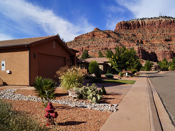 Desert-adapted homes in Kanab nestle against red rock formations that Hollywood directors have coveted for generations.