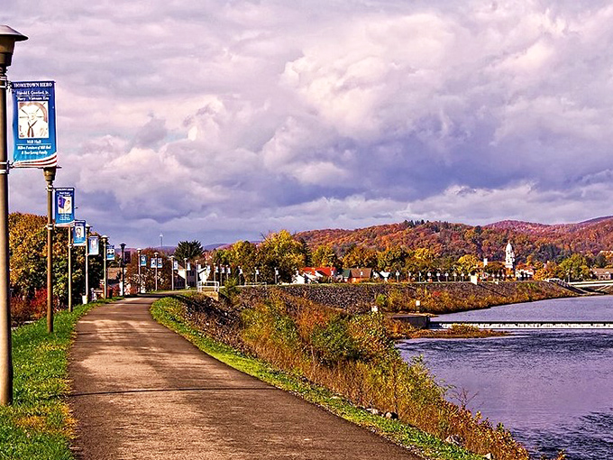 The riverside walking path in Lock Haven offers residents free entertainment with breathtaking views. Fall foliage and dramatic skies create a natural theater that doesn't require a subscription service!