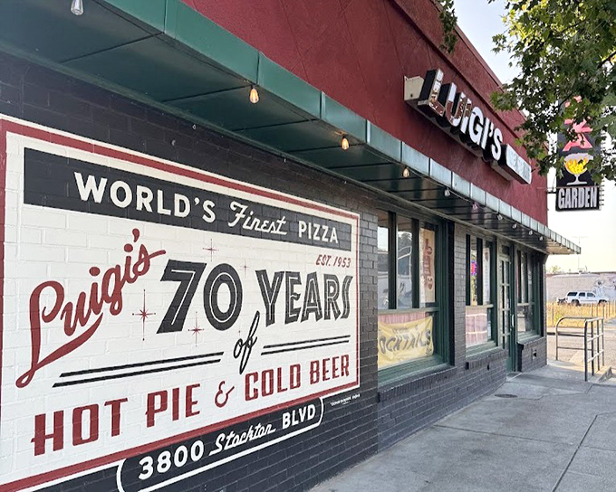 That vintage "70 Years" mural tells the story of generations who've made Luigi's their neighborhood pizza home. 