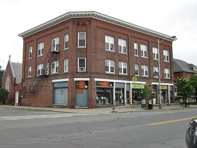 This unassuming building in Lyndonville might not make architectural magazines, but it represents the honest affordability that makes Vermont special.