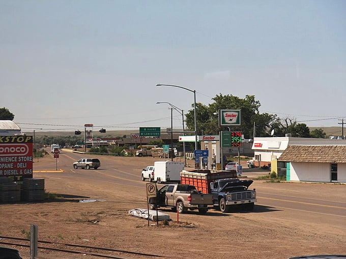 Malta's main street showcases the practical amenities that keep daily expenses low for residents living on a modest budget.