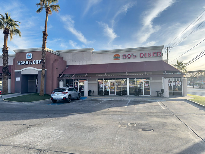 Those palm trees frame this retro paradise where every meal feels like a celebration of simpler times.