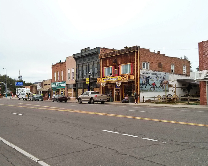 Red brick buildings line the street like old friends standing shoulder to shoulder through the decades.