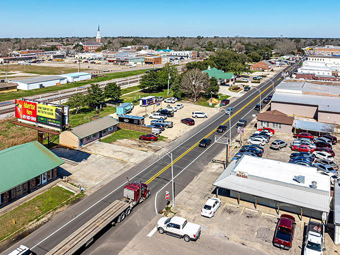 Small-town main streets stretch toward horizons filled with possibility, connecting past achievements with future dreams.