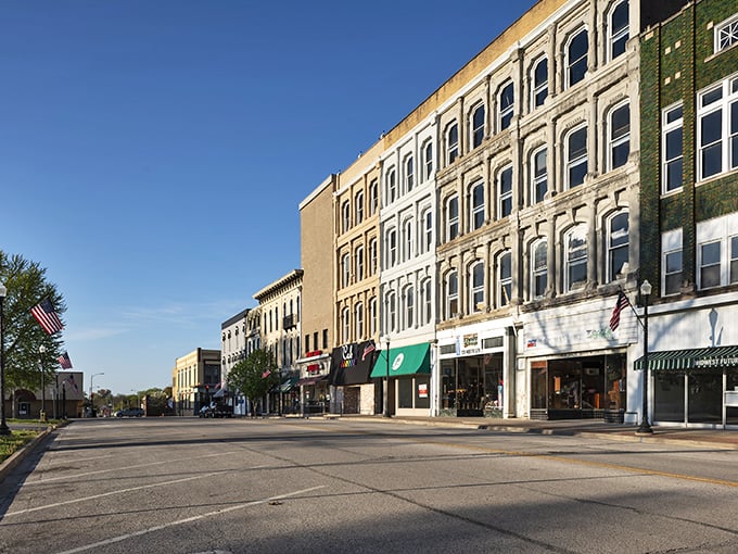 Sunshine on your savings! Quincy's historic streetscape basks in golden light, much like your retirement account glows when you live where costs stay earthbound.